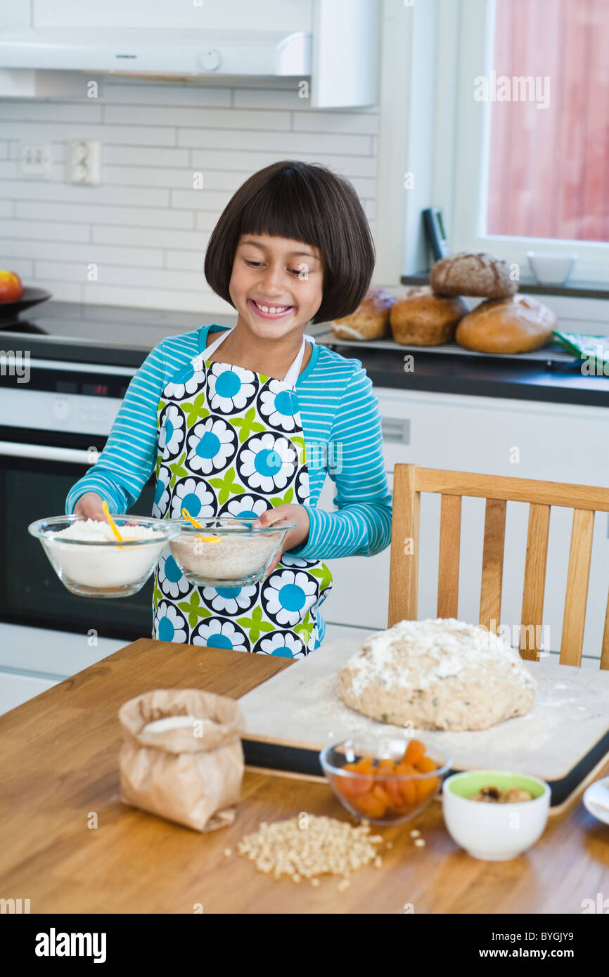 Girl baking in kitchen Stock Photo - Alamy