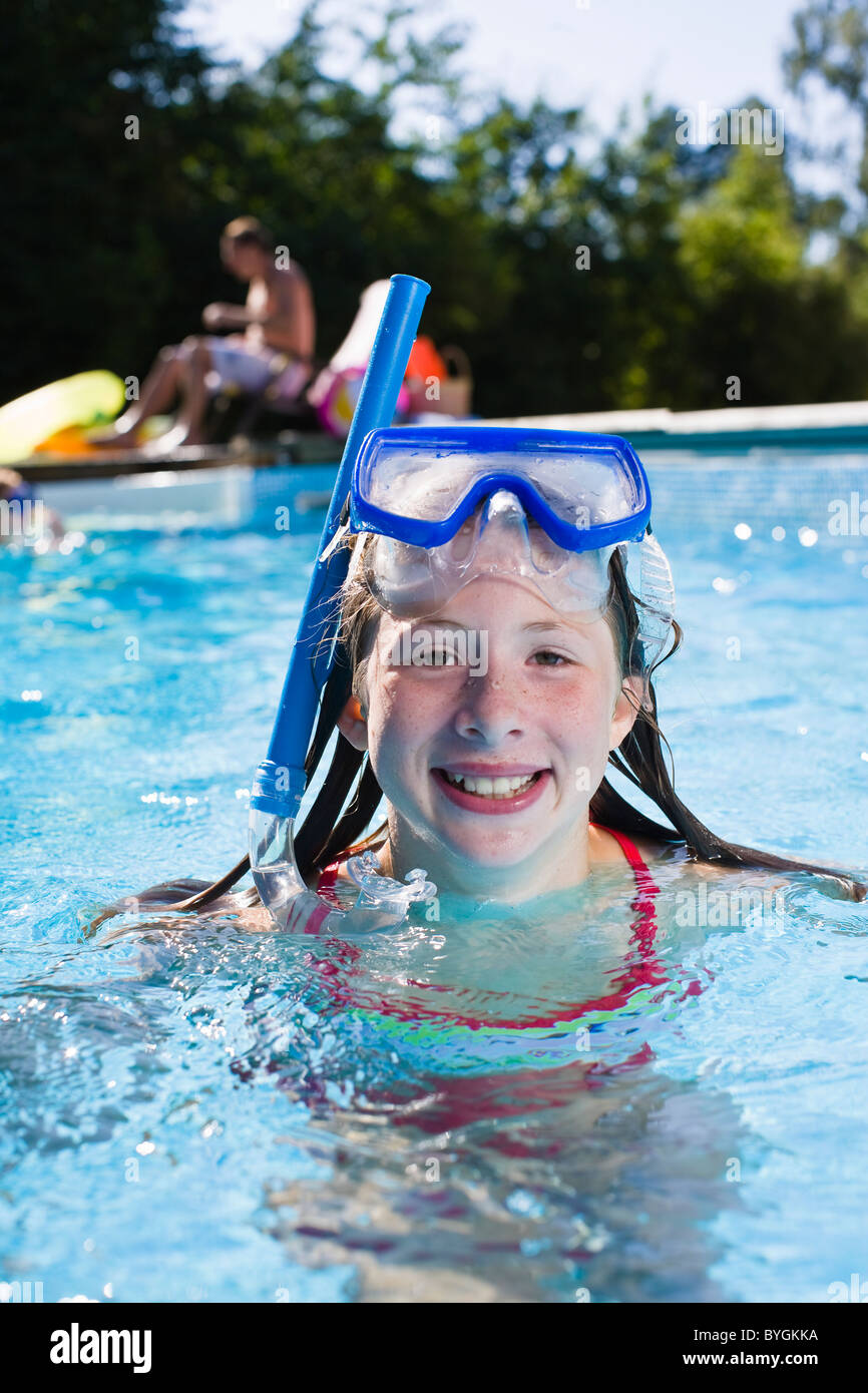 Portrait of girl with scuba mask in swimming pool Stock Photo - Alamy