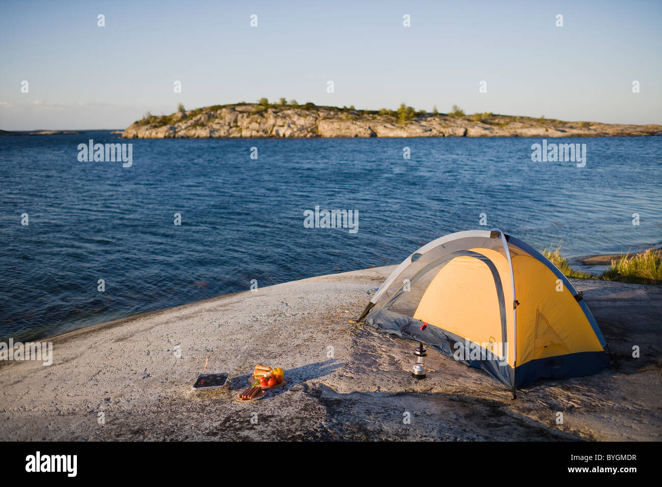 Tent on beach by sea Stock Photo - Alamy