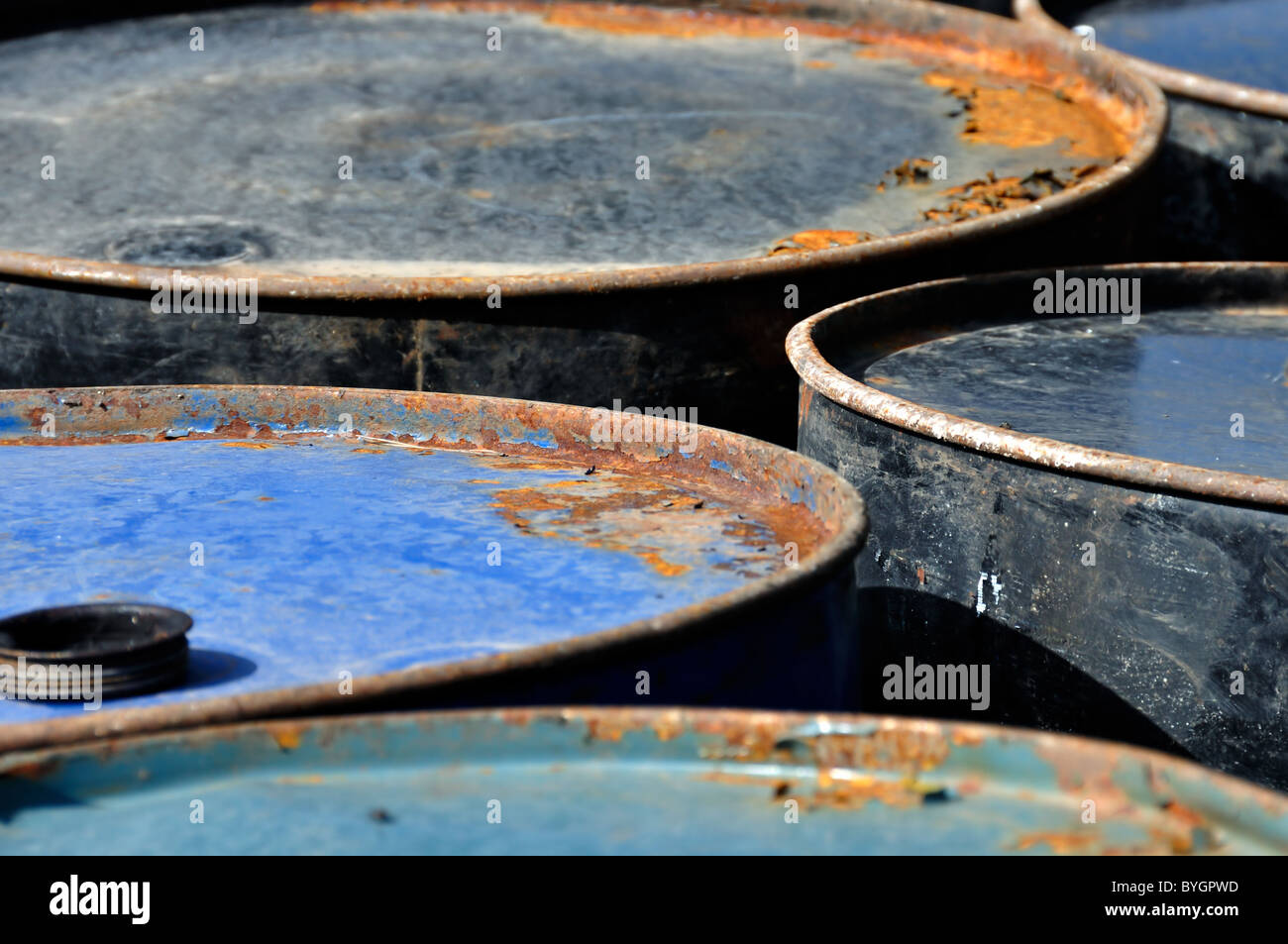 Rusty metal barrels macro. Abstract industrial background Stock Photo ...
