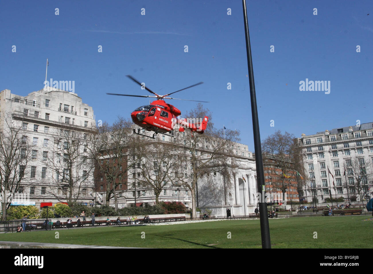A Virgin air ambulance lifts off at Marble Arch after an incident in ...
