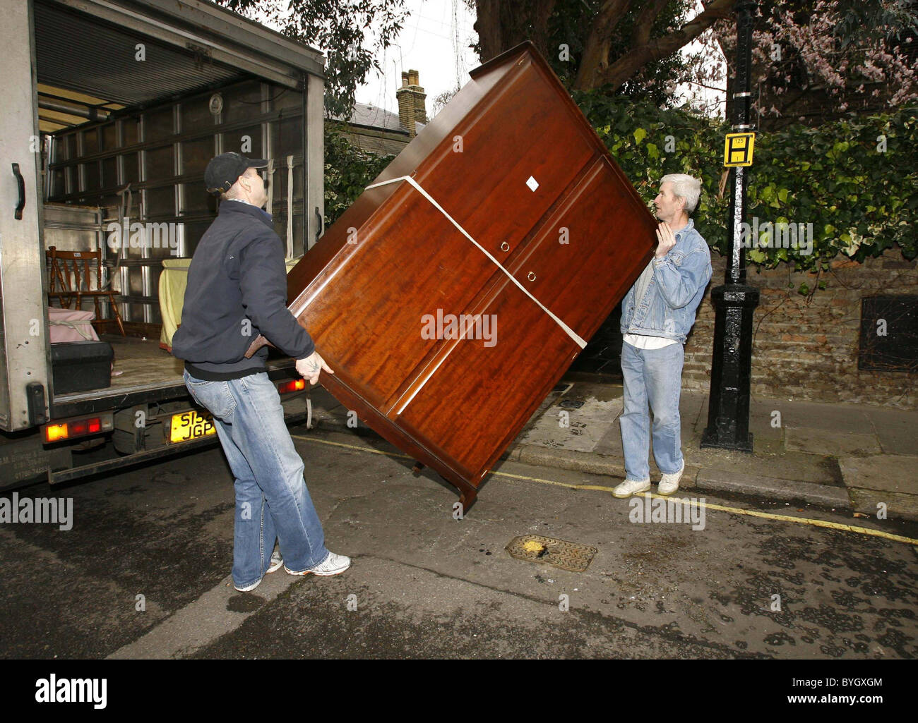 Pete Doherty arranges to have his furniture moved into the house owned ...