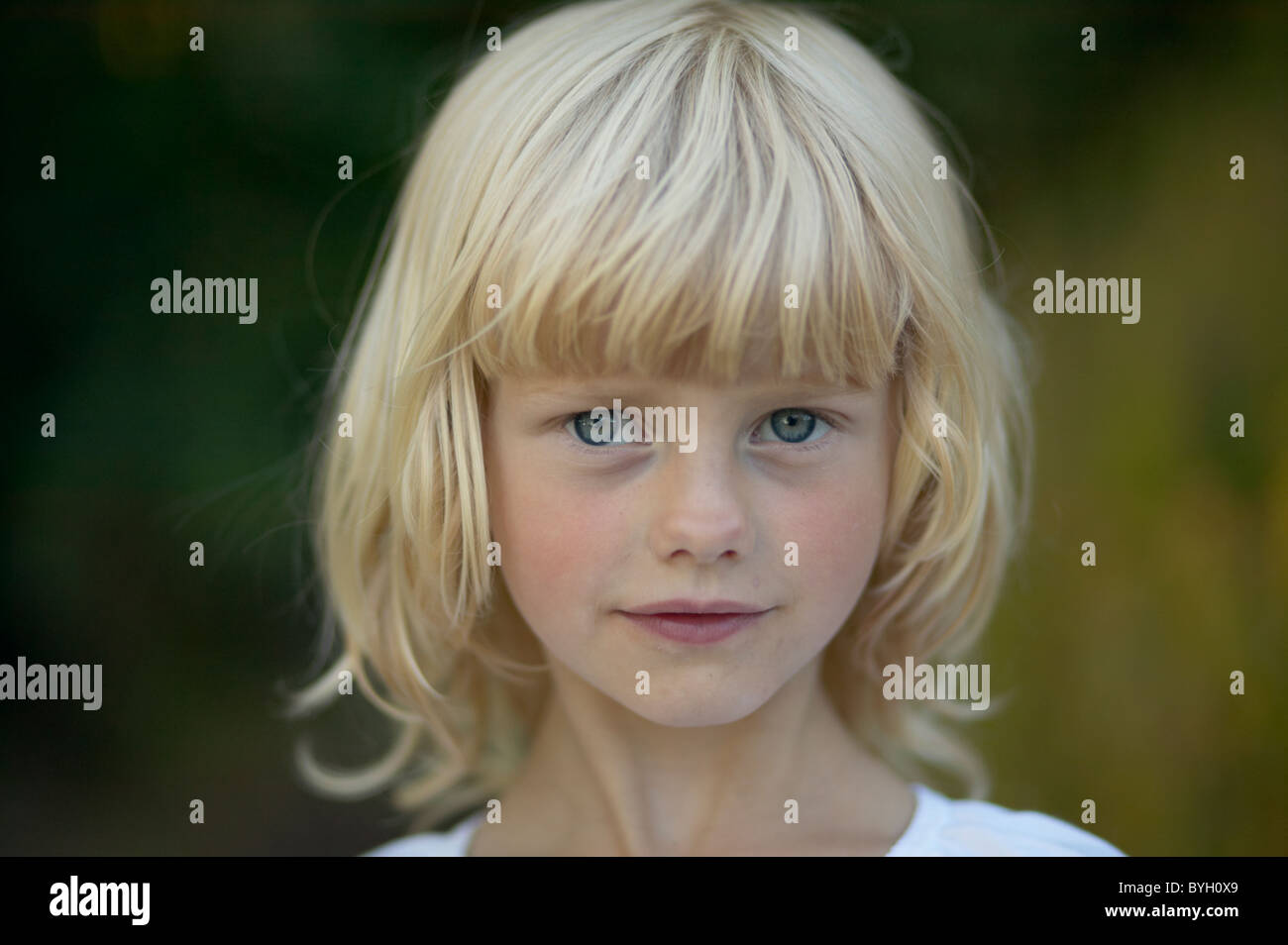 Portrait of blonde girl outdoors Stock Photo - Alamy