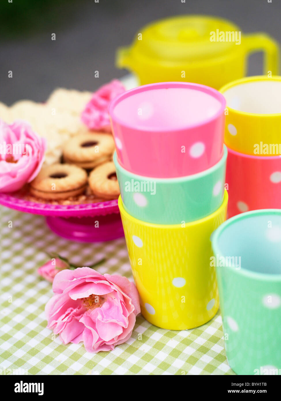 Still life with cookies and colorful crockery Stock Photo - Alamy