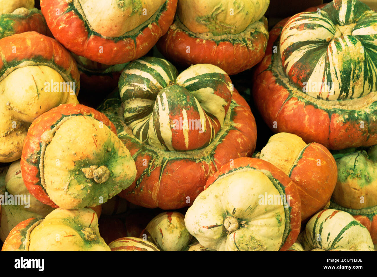 Small, medium and large turban squash Stock Photo - Alamy