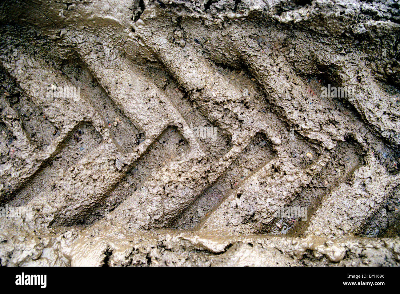 Tyre tracks in soft ground Stock Photo - Alamy