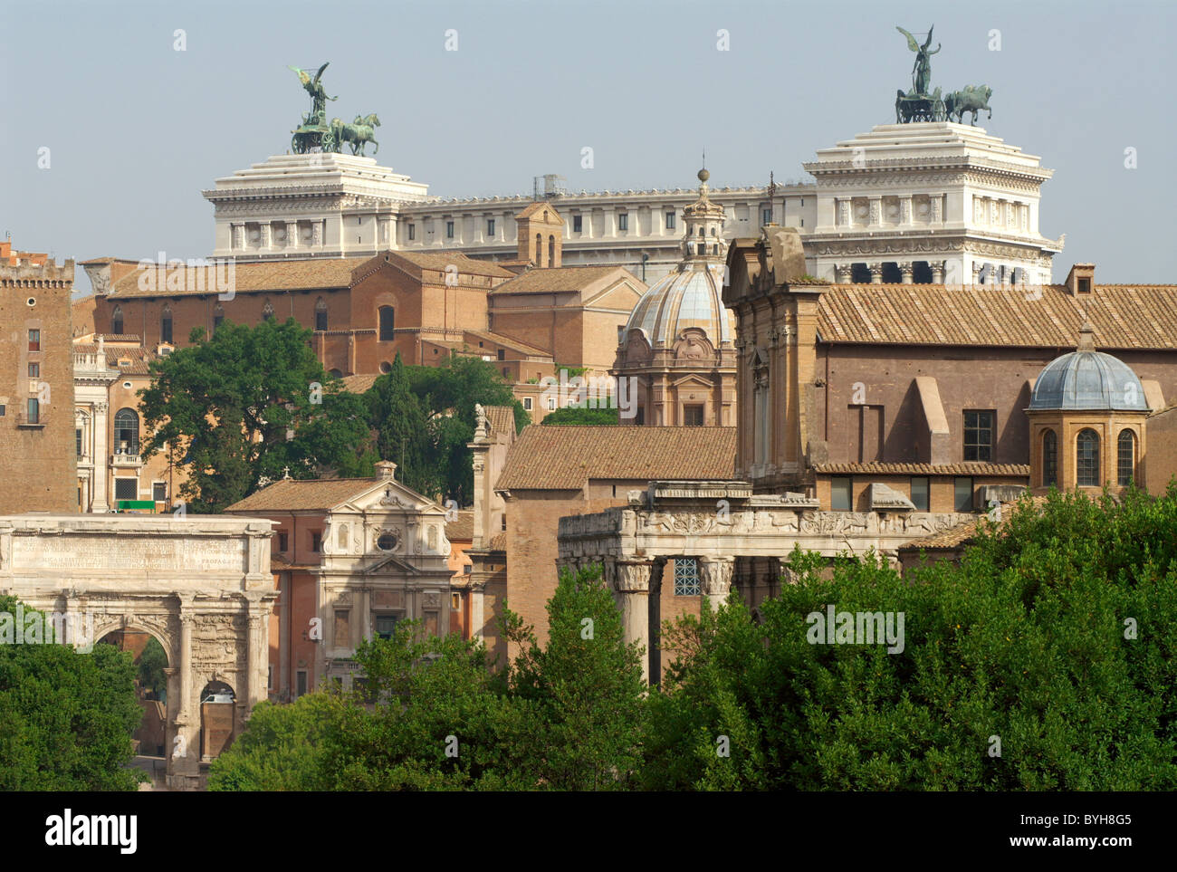 cityscape view showing the roman forum and the victor emmanuel monument ...