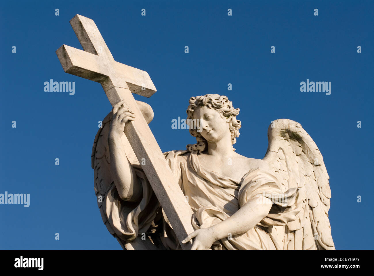 horizontal view of statue of Angel carrying cross on Ponte Sant' Angelo ...