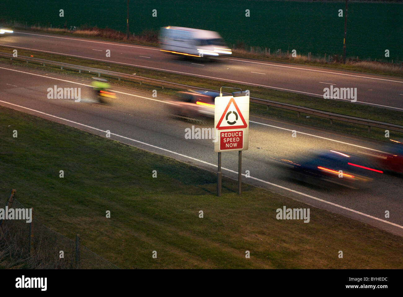 Road sign reduce speed now hi-res stock photography and images - Alamy
