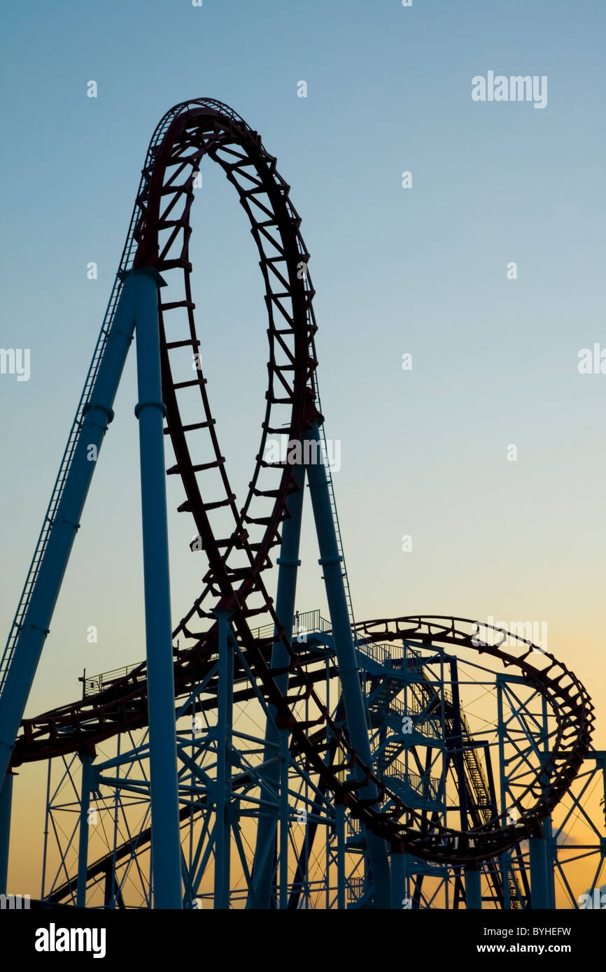 Roller Coaster Loop at Sunset Stock Photo - Alamy