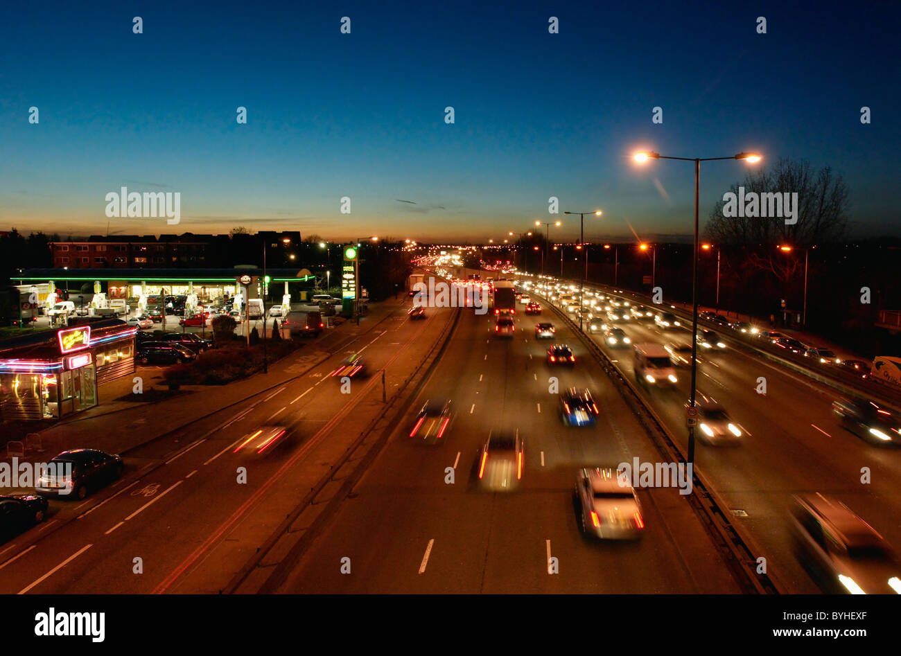 Road traffic on the A40 at night London UK Stock Photo - Alamy