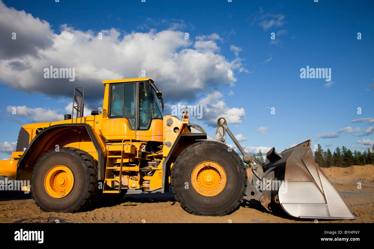 Side profile of a Volvo L180F front loader , Finland Stock Photo - Alamy
