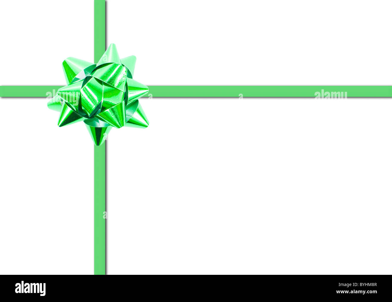 Green gift ribbon over a white background Stock Photo - Alamy