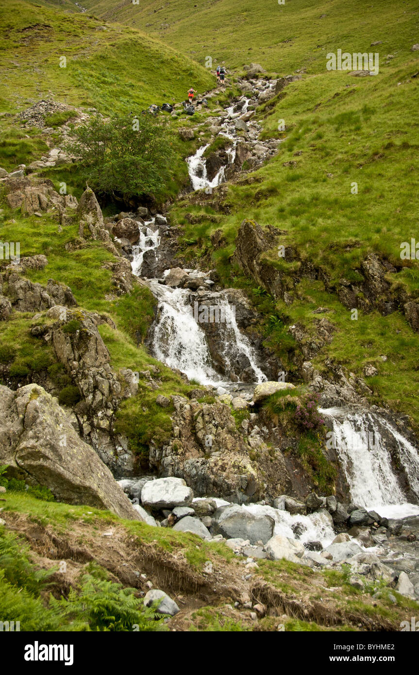 Lingmell Gill on ascent of Scafell Pike, with walkers in the distance ...