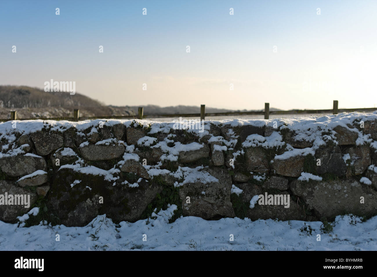A snow covered traditional Cornish stone wall on a farm near Carbis Bay ...