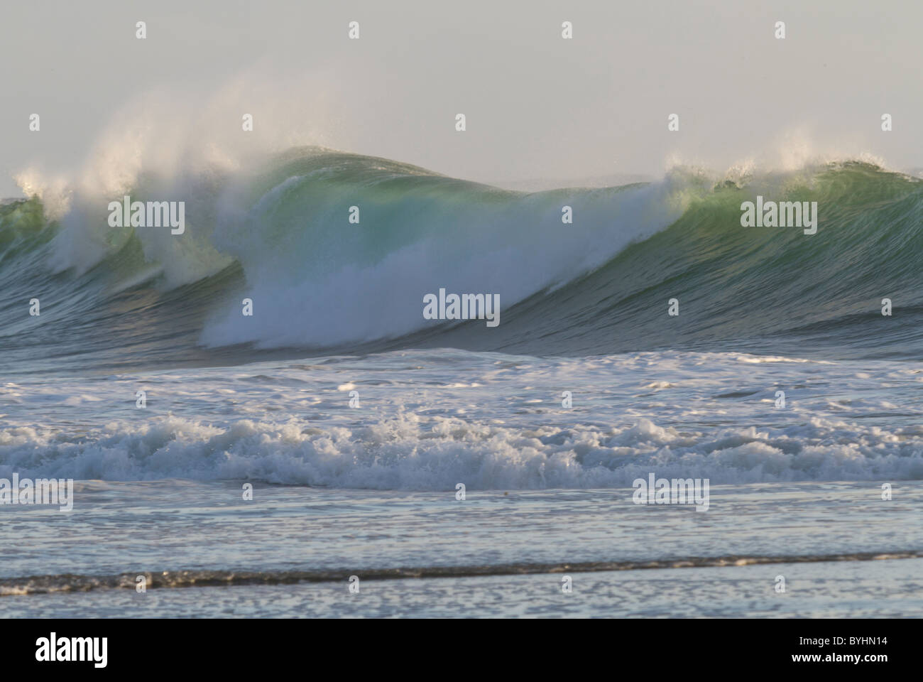 Wave with foam Stock Photo - Alamy