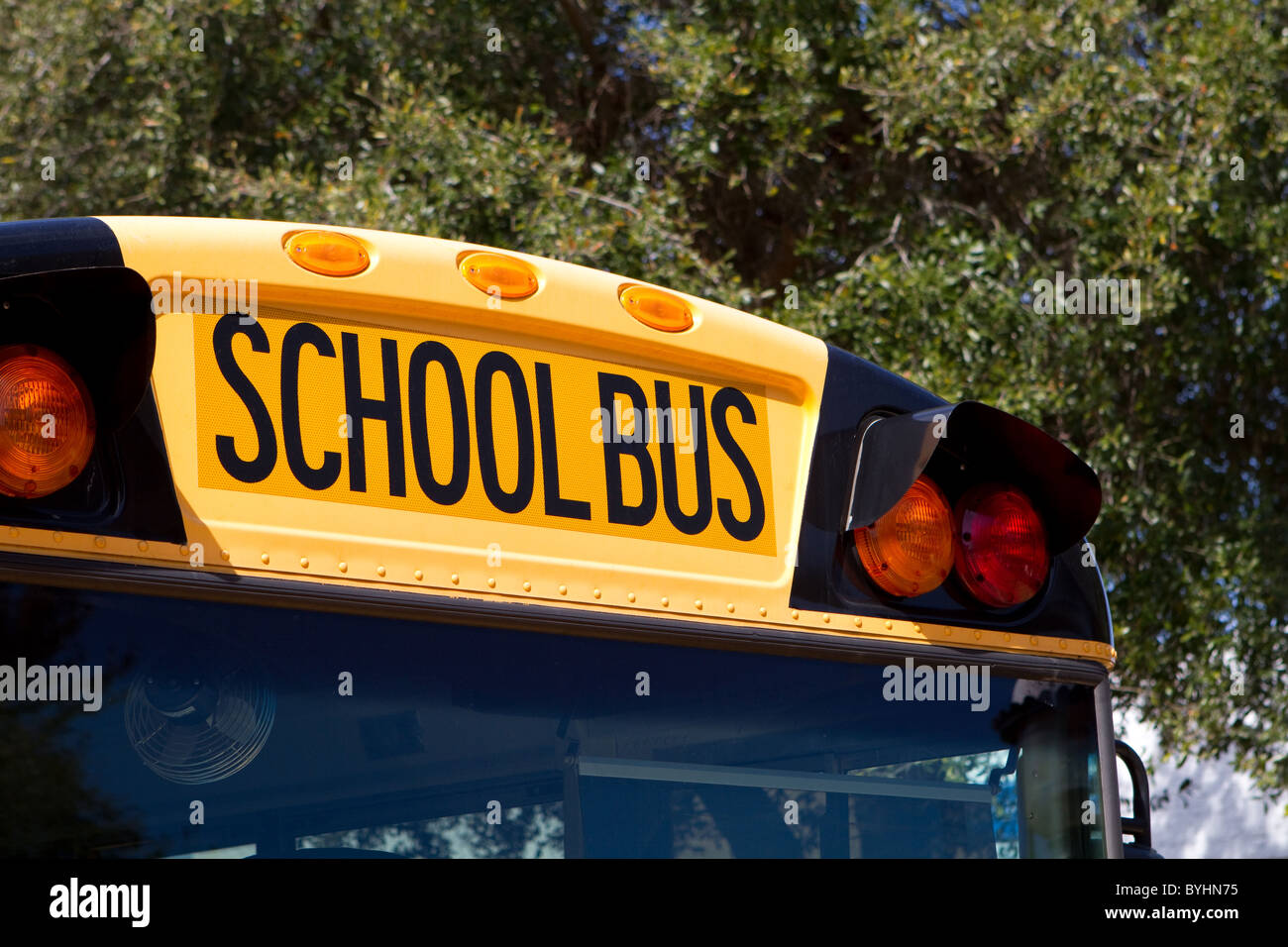 Top front of a yellow school bus with red and amber lights Stock Photo ...