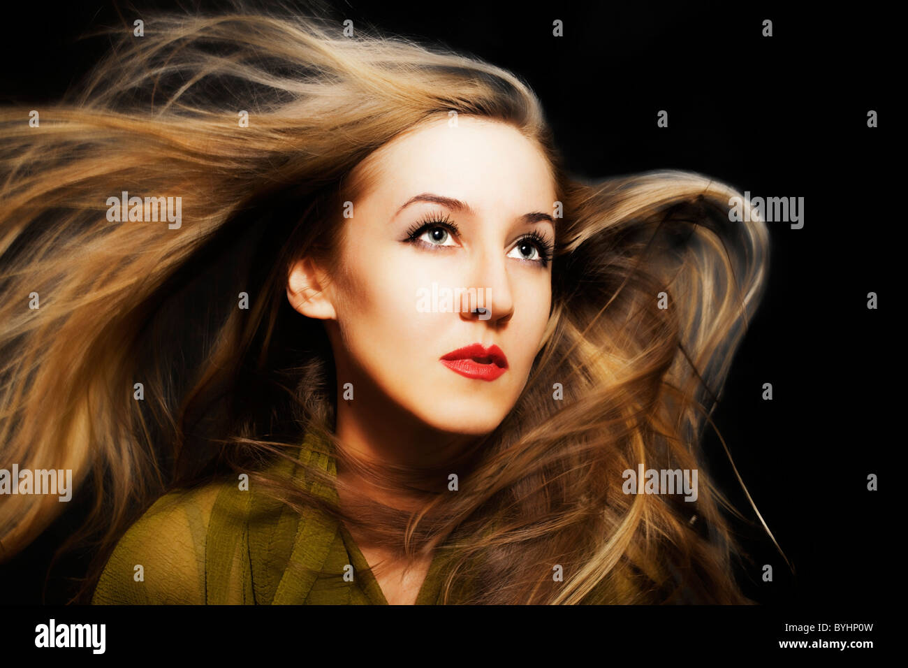 healthy beautiful long hair in motion created by wind, fashion look ...