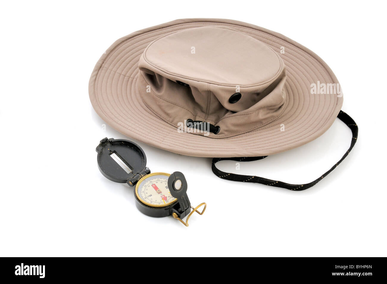 Studio photography of a walkers 'Tilley hat ', and marching compass ...