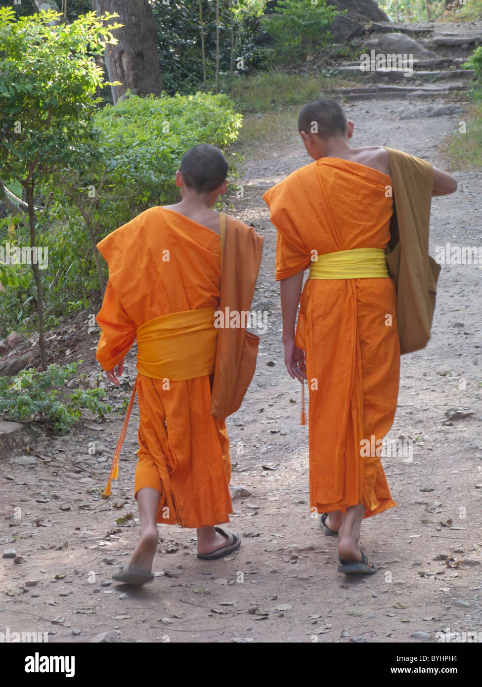 LAOS.MONKS IN A BUDDHIST MONASTERY IN THE HOLY CITY OF LUANG PRABANG ...