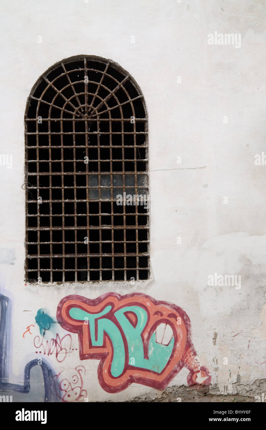 Graffiti marking a white wall in Tuscany, Italy Stock Photo - Alamy