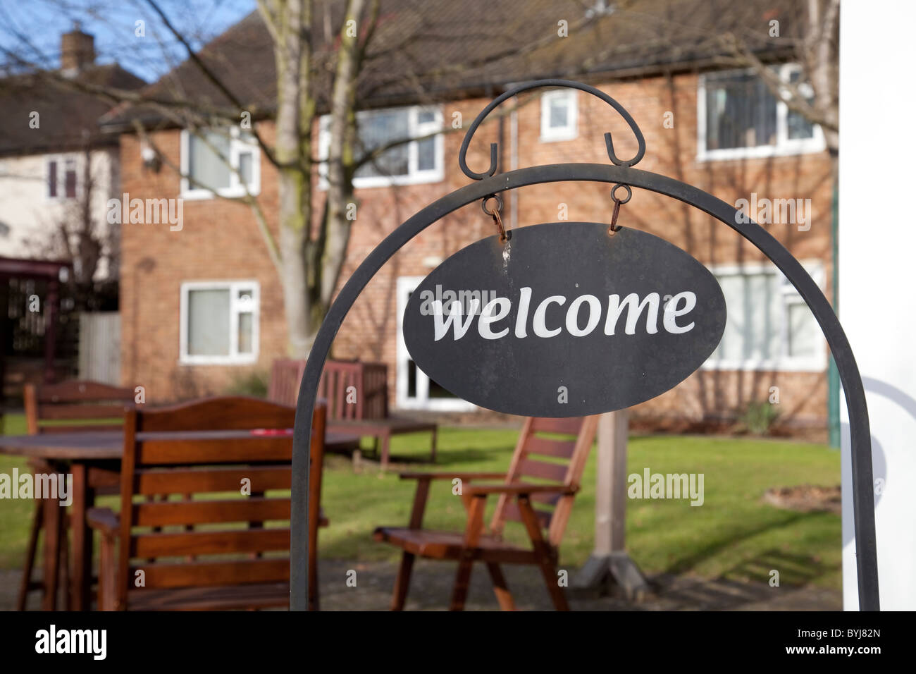 A welcome sign outside the entrance to a building, England UK Stock ...