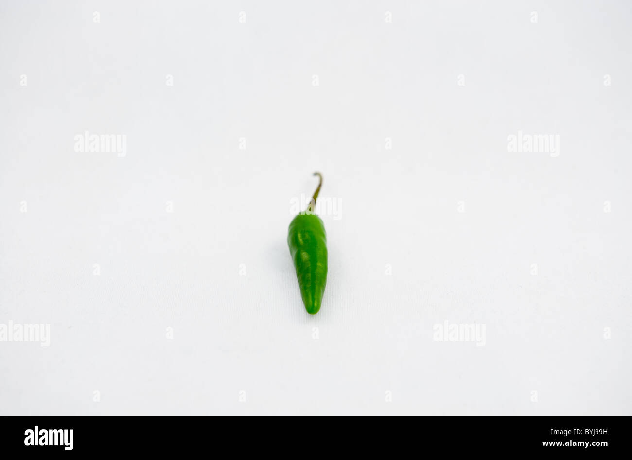Single green chili peppers Stock Photo - Alamy