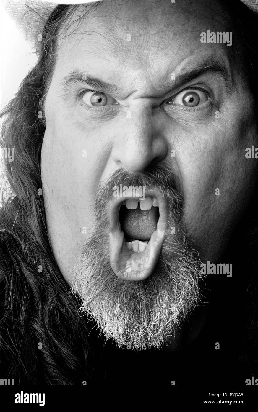 Angry man and long white beard Black and White Stock Photos & Images ...