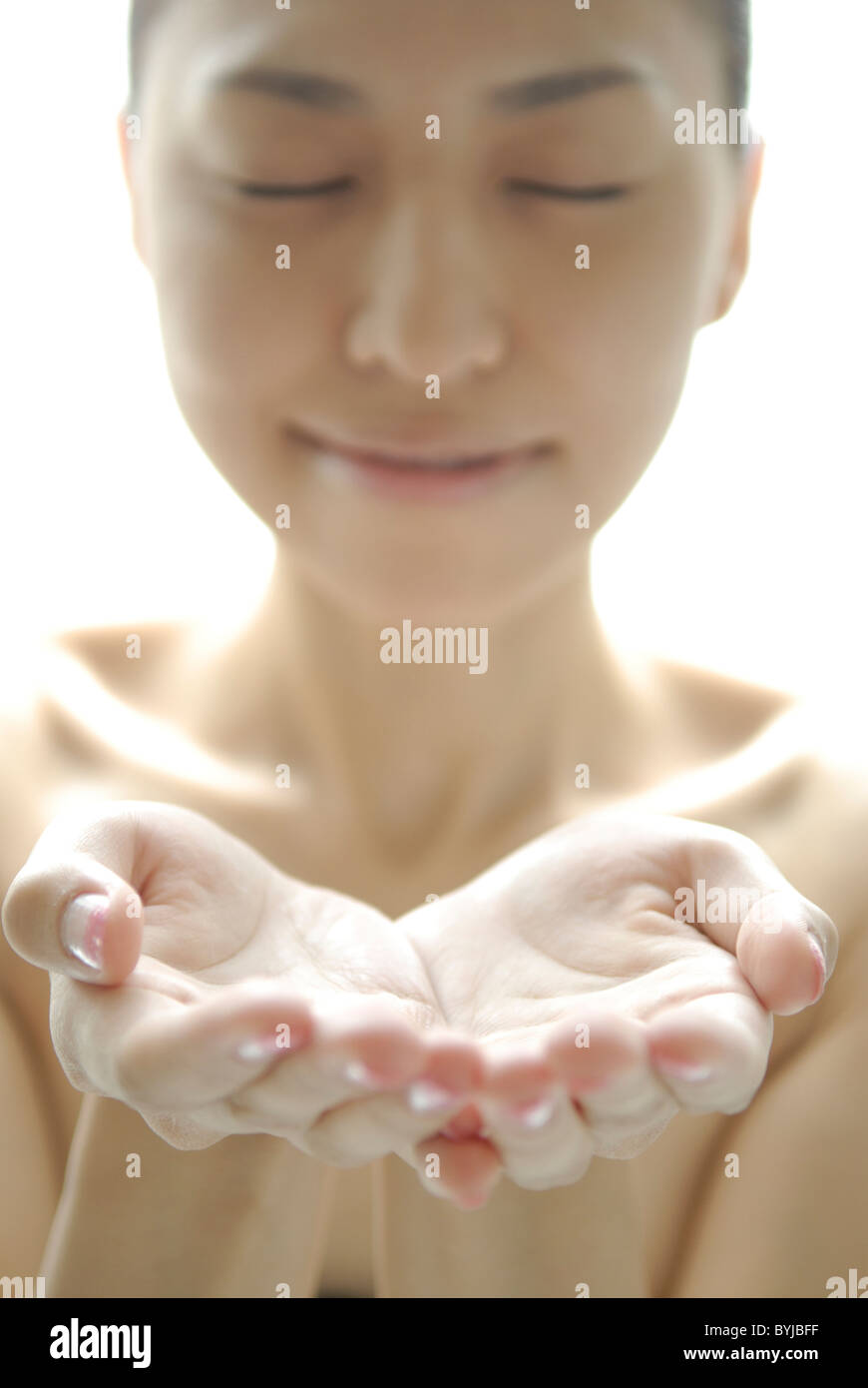 Woman cupped hands hi-res stock photography and images - Alamy