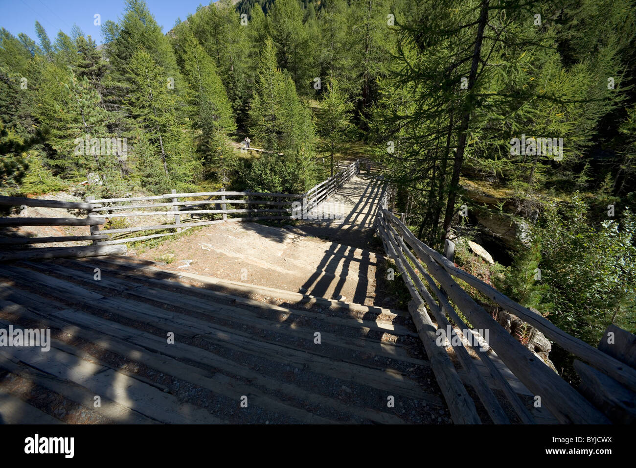 Timber bridge over the Plima river high in the Martell valley, Stelvio ...