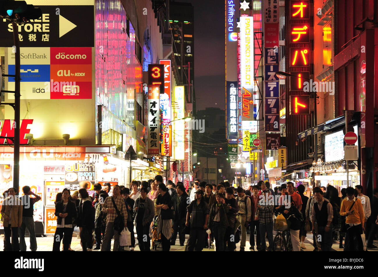 Crowded Street at Night Stock Photo - Alamy