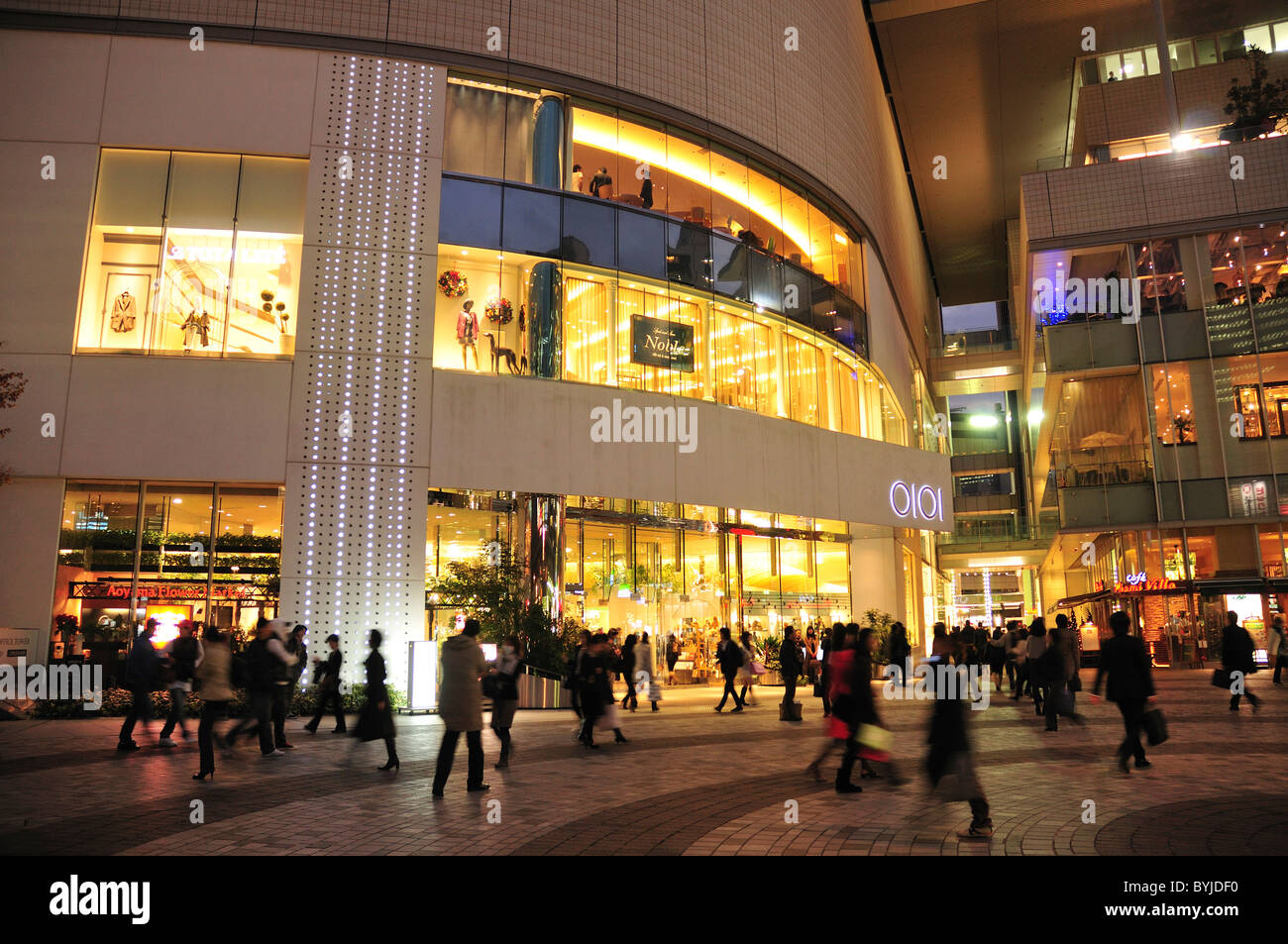 Crowded Town Square at Night Stock Photo - Alamy