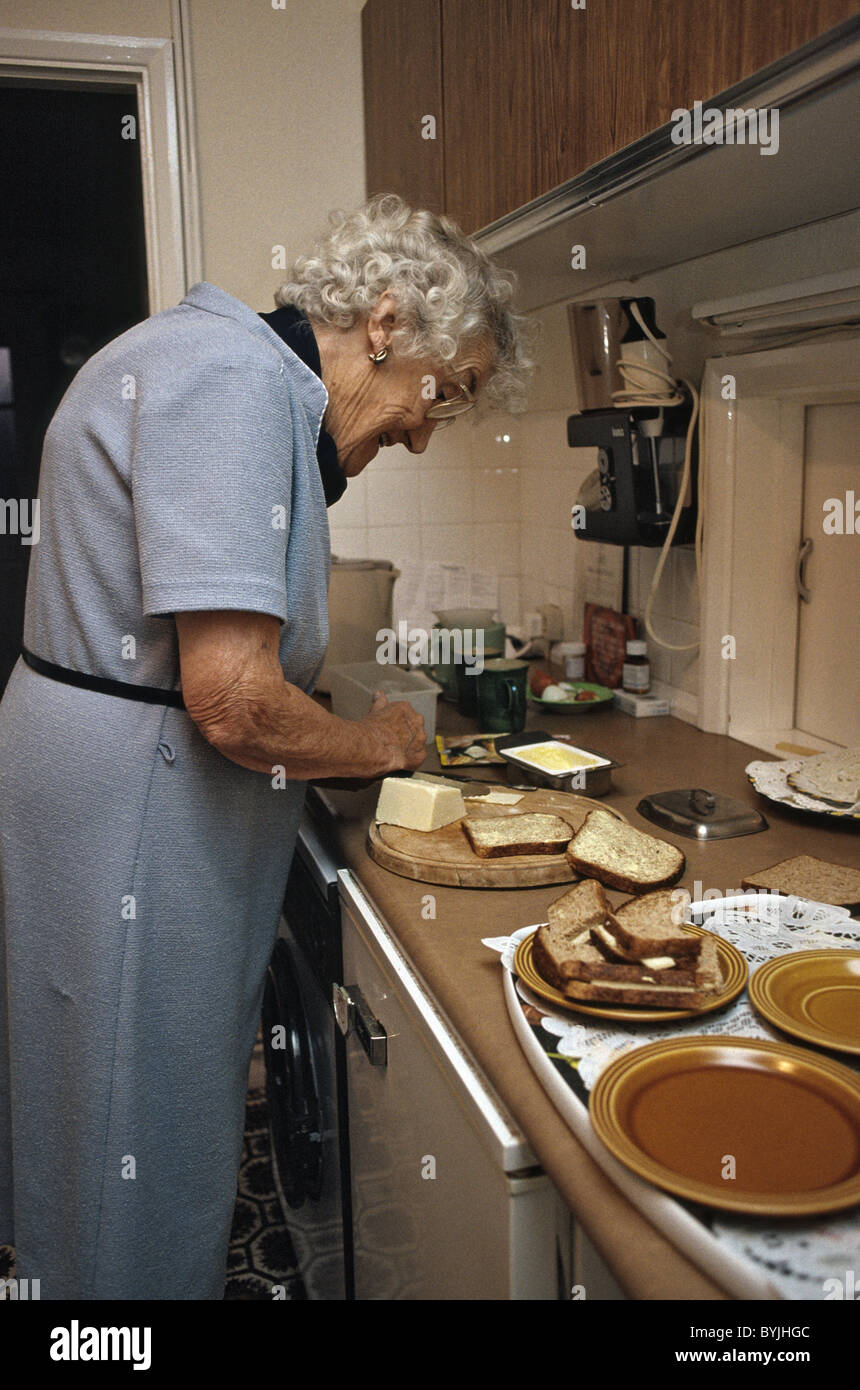 Old woman making sandwiches for lunch Stock Photo - Alamy