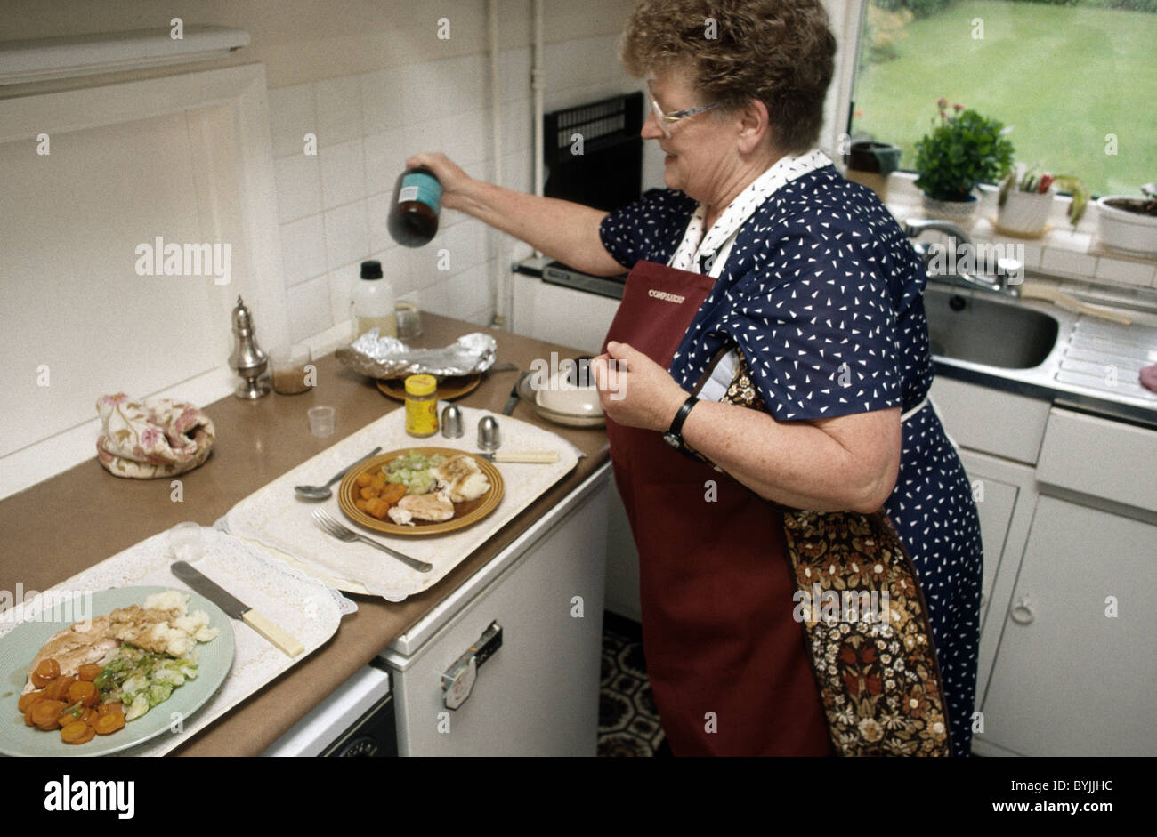 Carer helping elderly food hi-res stock photography and images - Alamy