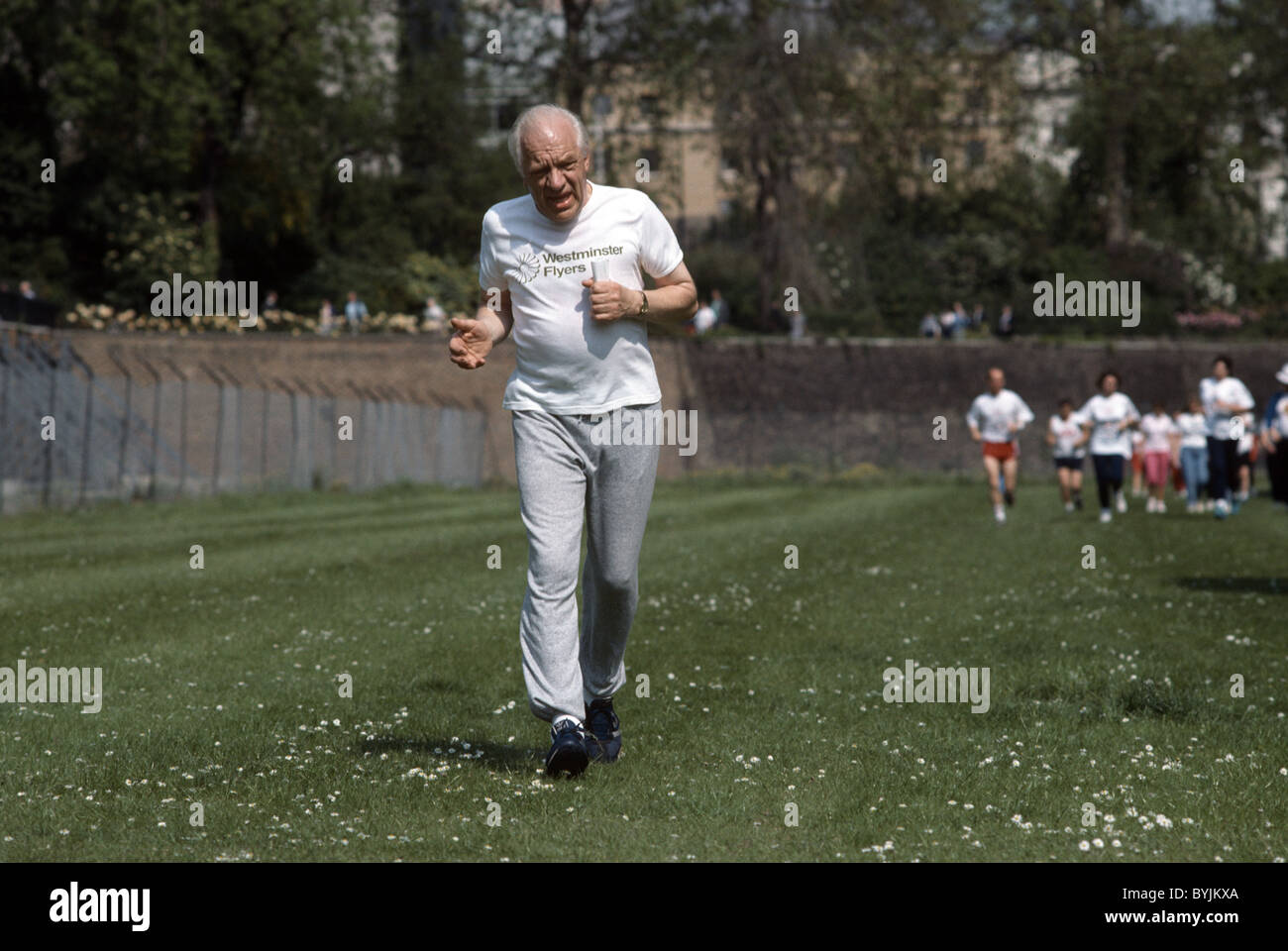 Old man participating in a fun run Stock Photo - Alamy