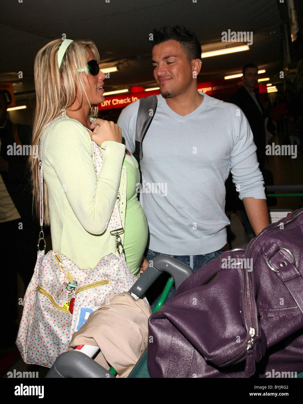 Katie Price aka Jordan and Peter Andre waiting to board a flight to Los ...