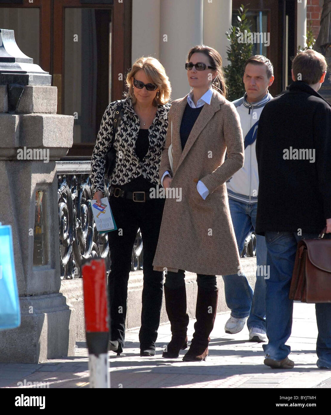 Kate Middleton and her mother Carole stop to look through the postcards ...