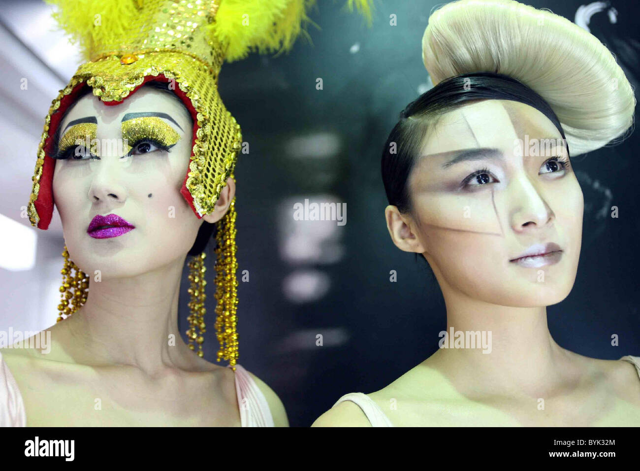 COLOURFUL MAKE UP Models show off their colourful make-up by Christian ...