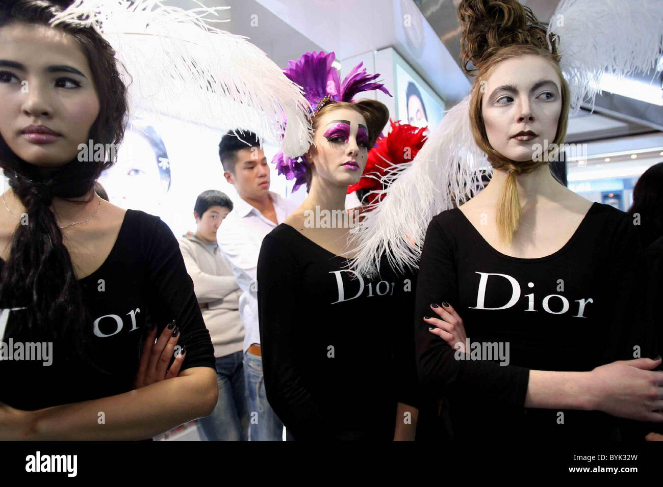 COLOURFUL MAKE UP Models show off their colourful make-up by Christian ...