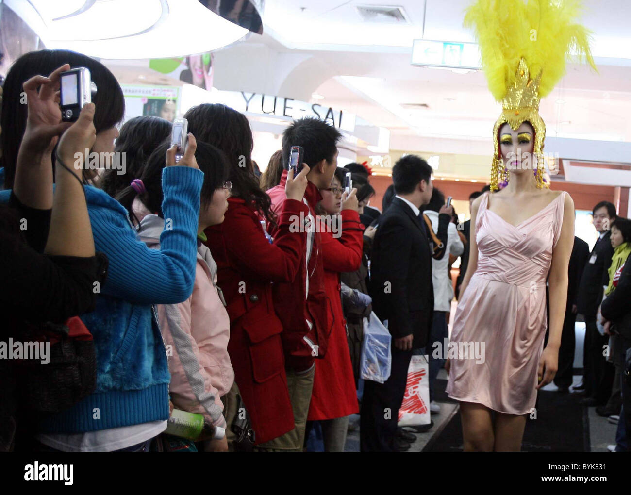 COLOURFUL MAKE UP Models show off their colourful make-up by Christian ...