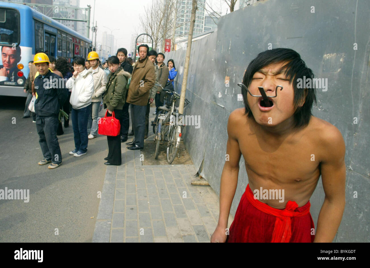 BEGGAR PERFORMS DEATH-DEFYING TRICKS Some people will do anything for ...