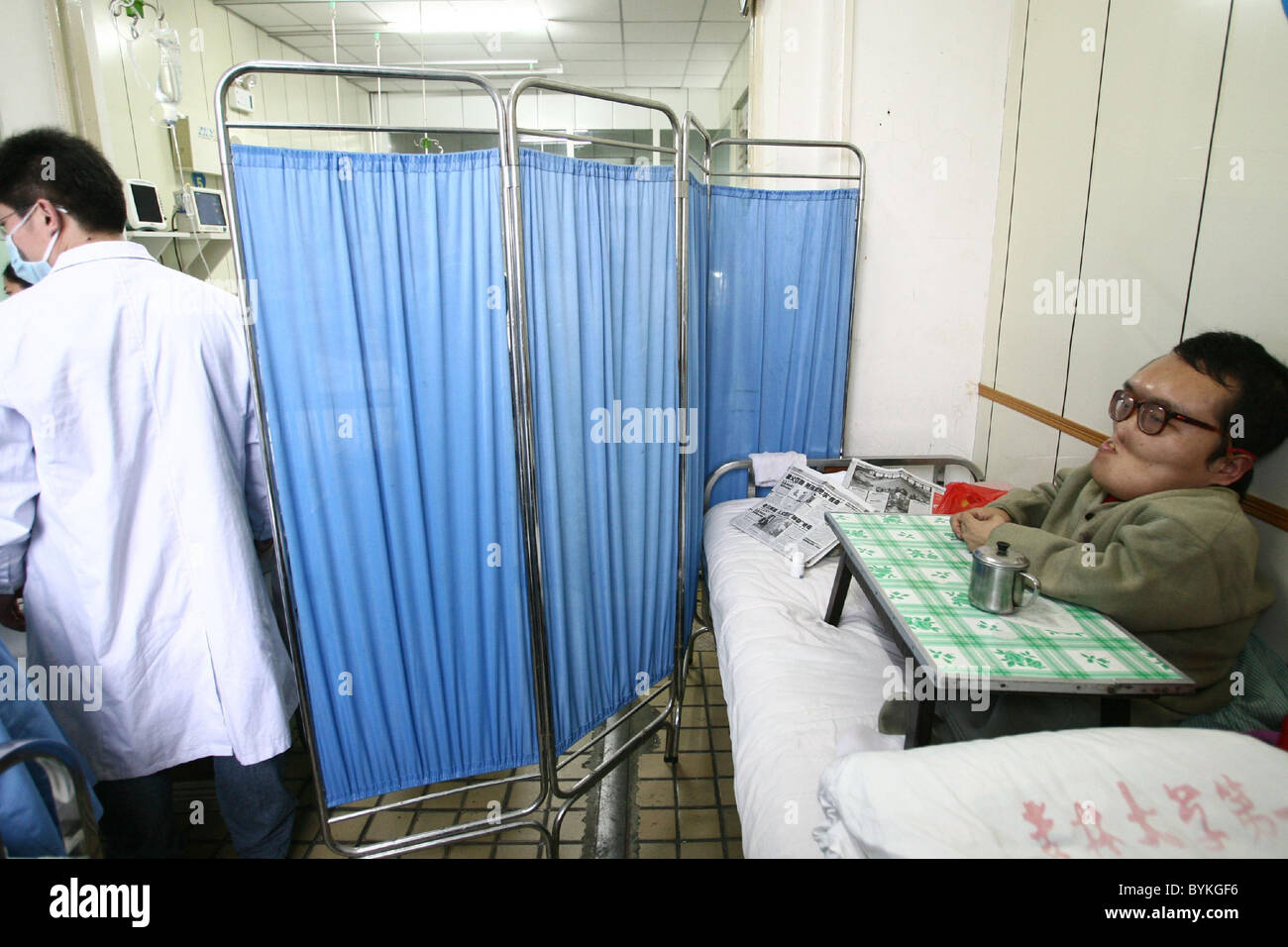 DEFORMITY BAFFLES DOCTORS Even making a simple telephone call is an ...