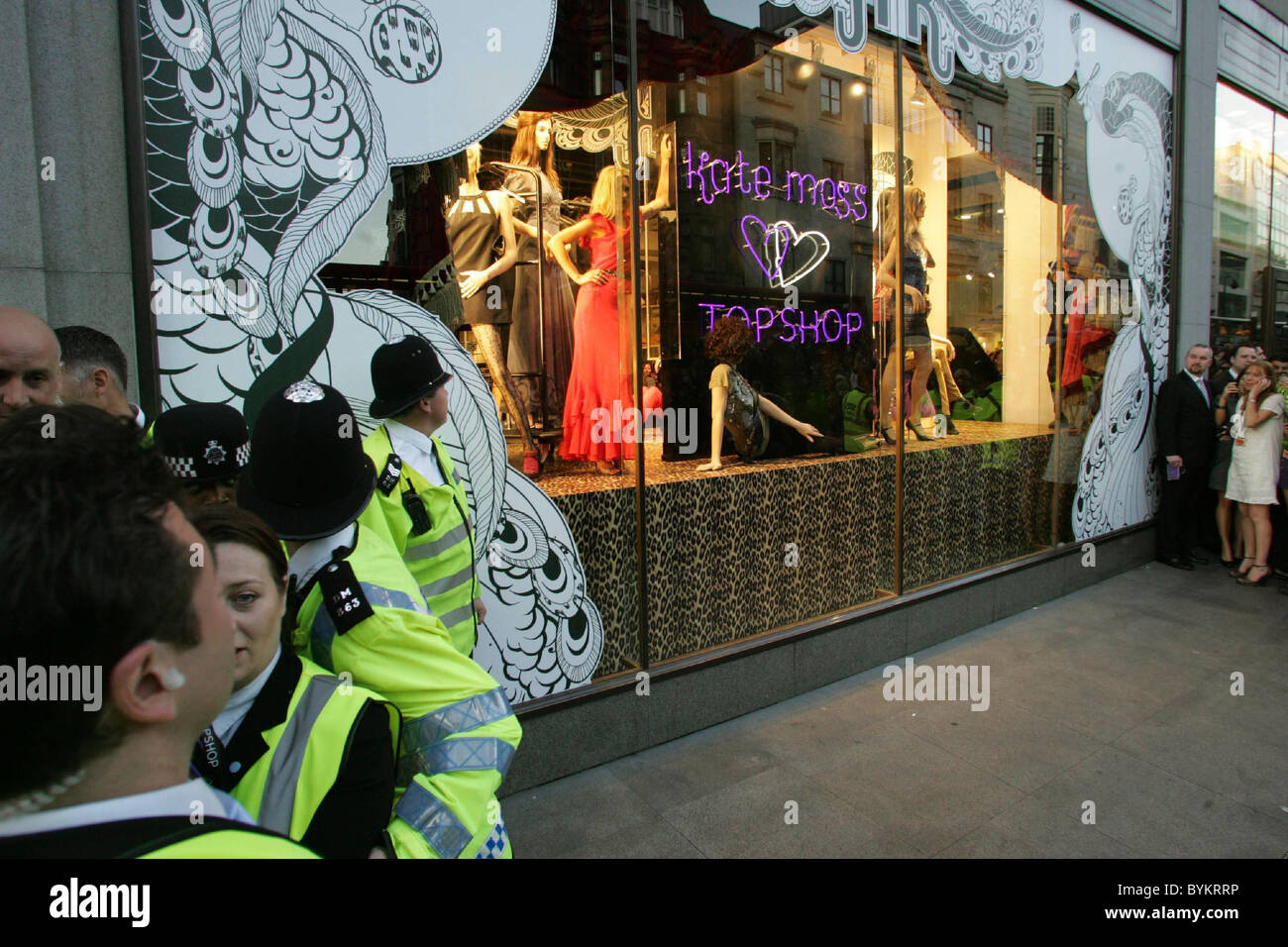 Kate Moss promoting her clothing line in the window of the fashion ...