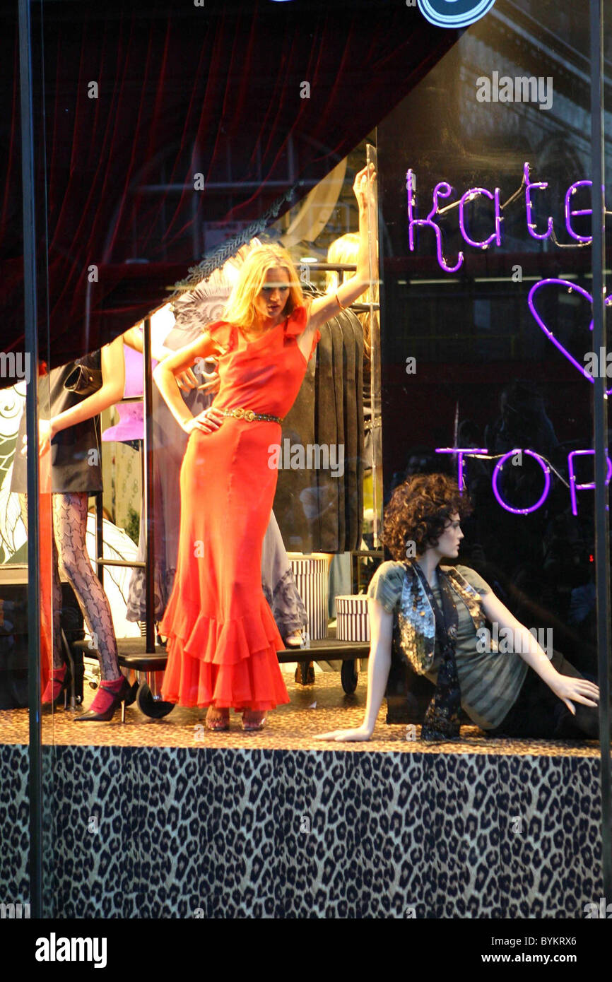 Kate Moss promoting her new clothing line in the window of the fashion ...