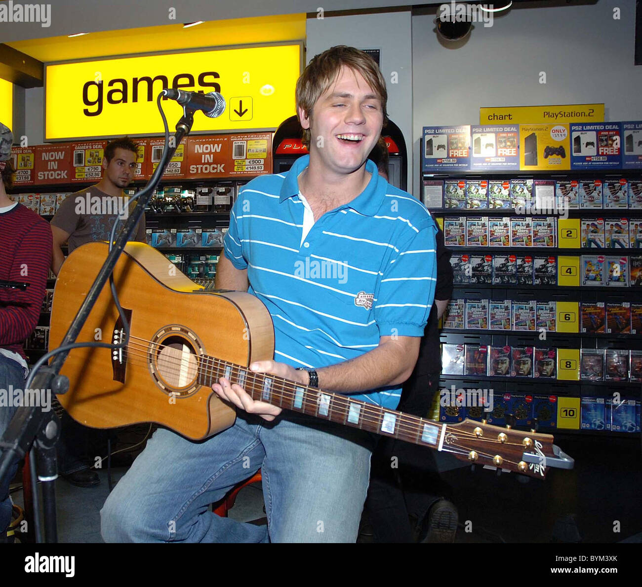 Brian McFadden performs his new single 'like Only a Woman Can' at HMV ...