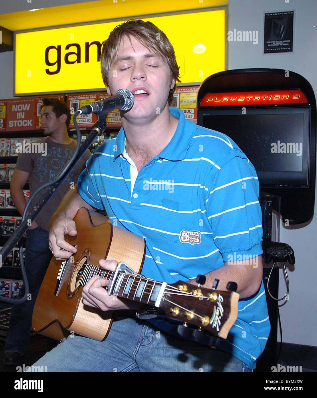 Brian McFadden performs his new single 'like Only a Woman Can' at HMV ...