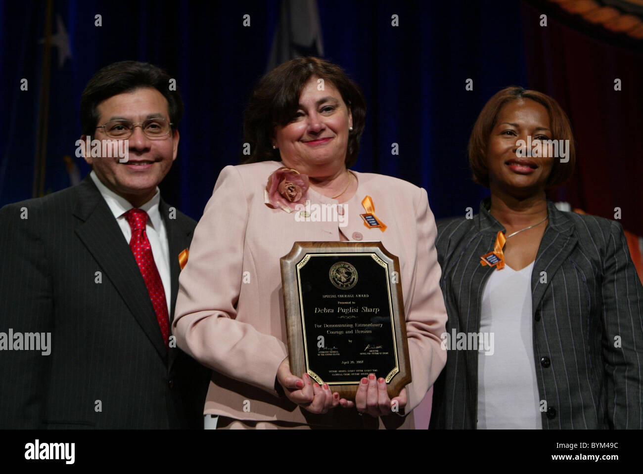 Attorney General Alberto Gonzales, Debra Puglisi Sharp and Regina ...
