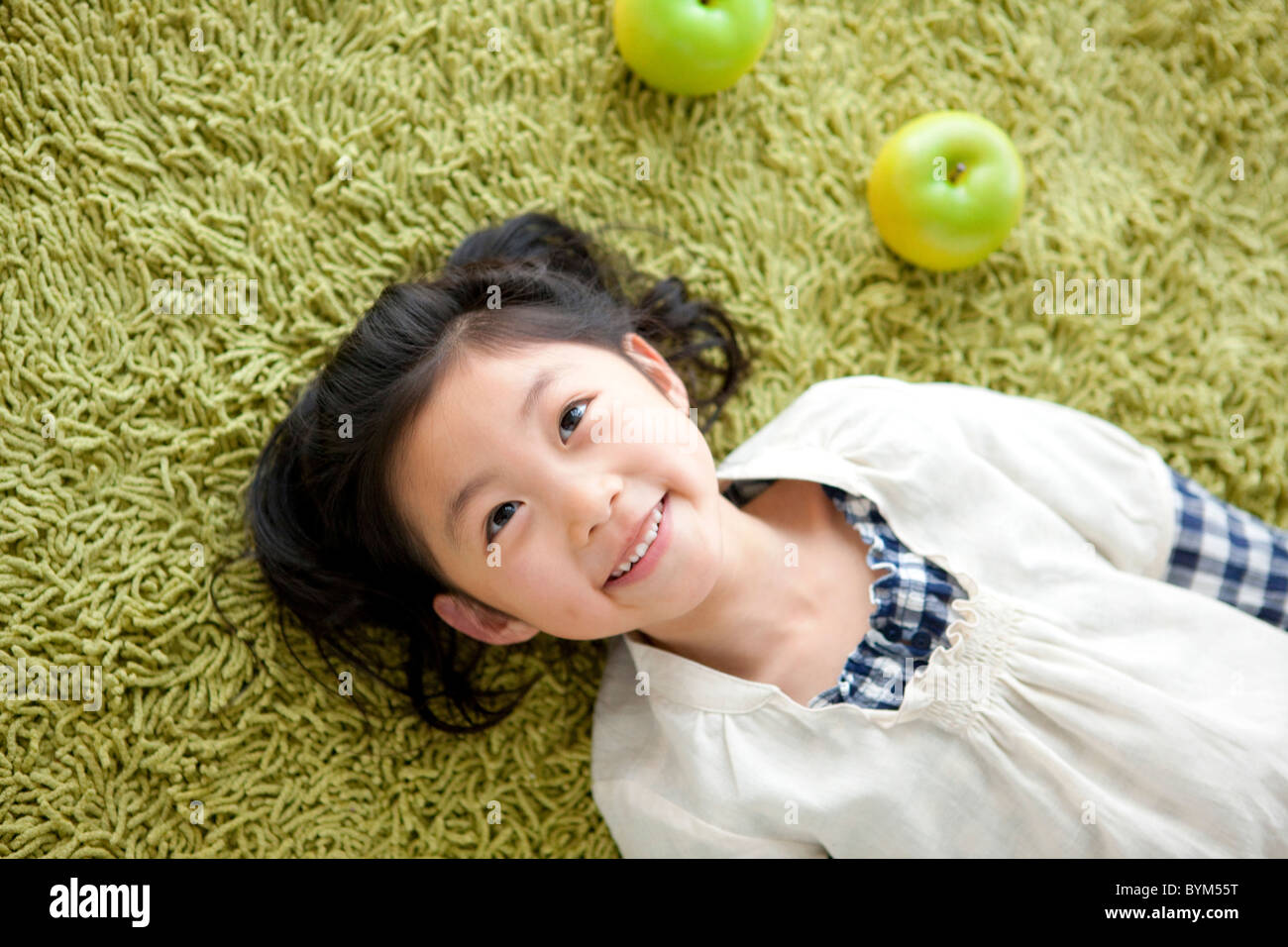Woman lying on rug drink hi-res stock photography and images - Alamy