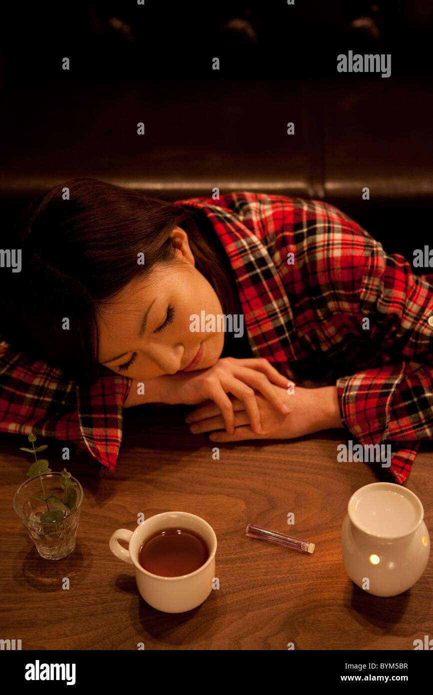 A woman relaxing Stock Photo - Alamy