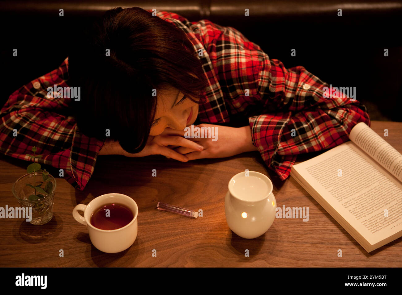 A woman relaxing Stock Photo - Alamy